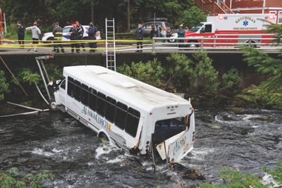 No injuries reported in tour bus fall into Ketchikan Creek; only driver ...