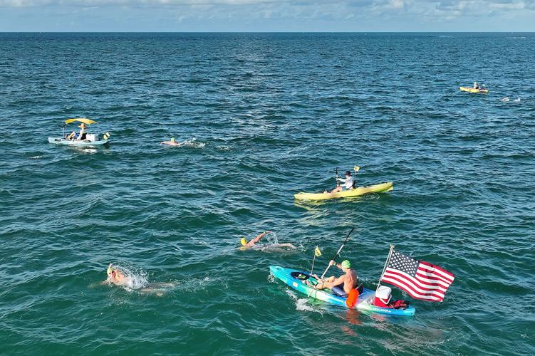 Coral Shores swimmer Smith makes history at annual Swim to Alligator ...