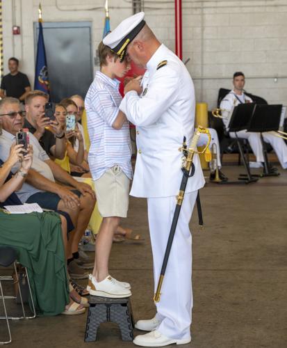Capt. Colin Thompson’s son pins the command pin | Community | keysnews.com