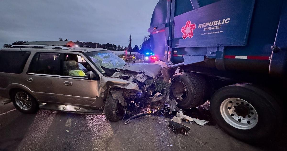 Driver sent to hospital after crash involving garbage truck | News ...