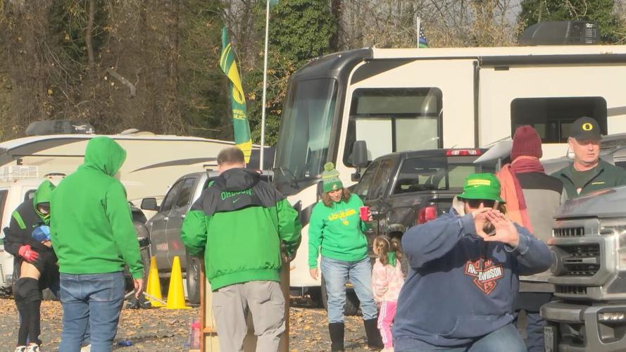 Duck fans tailgate ahead of their final season game against the Huskies ...