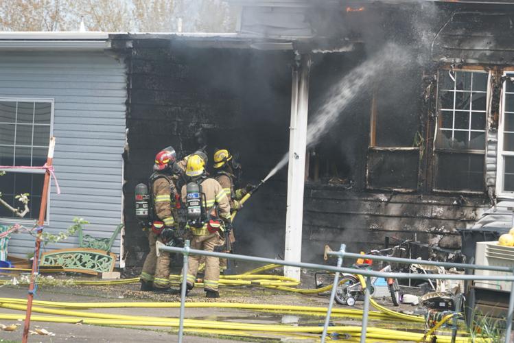 Lebanon firefighters cut holes in roof to battle house fire | Local ...