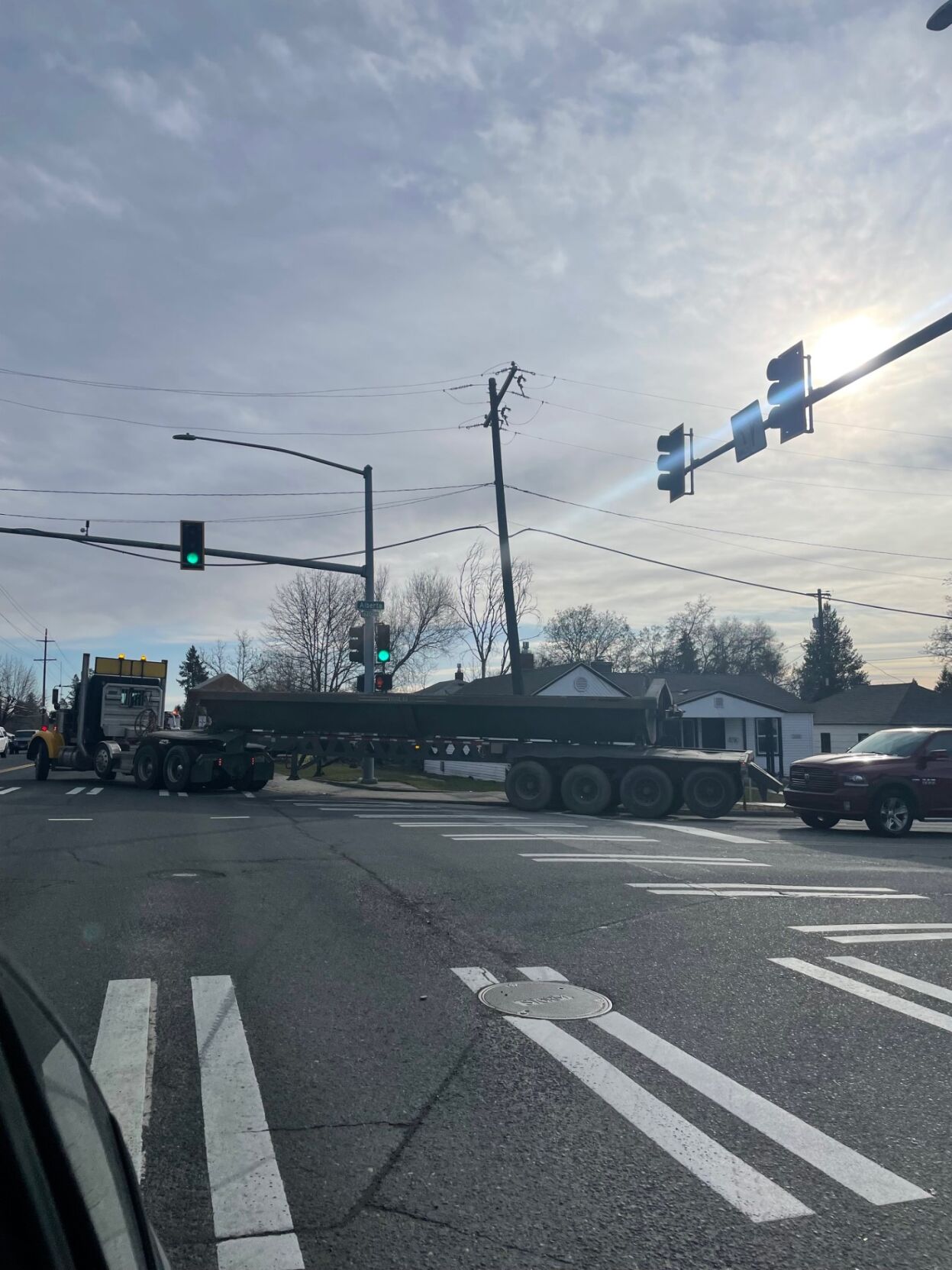 Semi-truck collision with light pole causes traffic along Francis ...