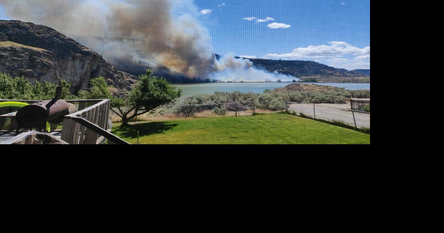 20-acre fire in Osborn Bay forces people into water, fire crews in mop ...