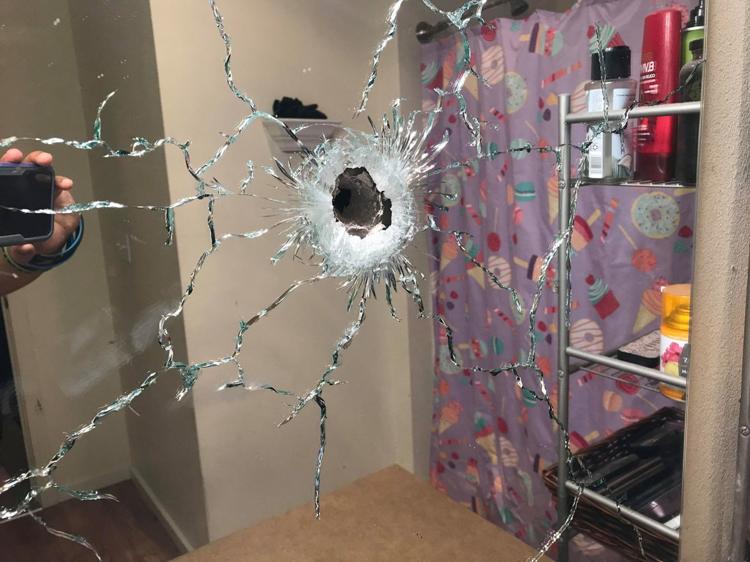 Spokane family shaken after bullet shoots through their bathroom mirror ...