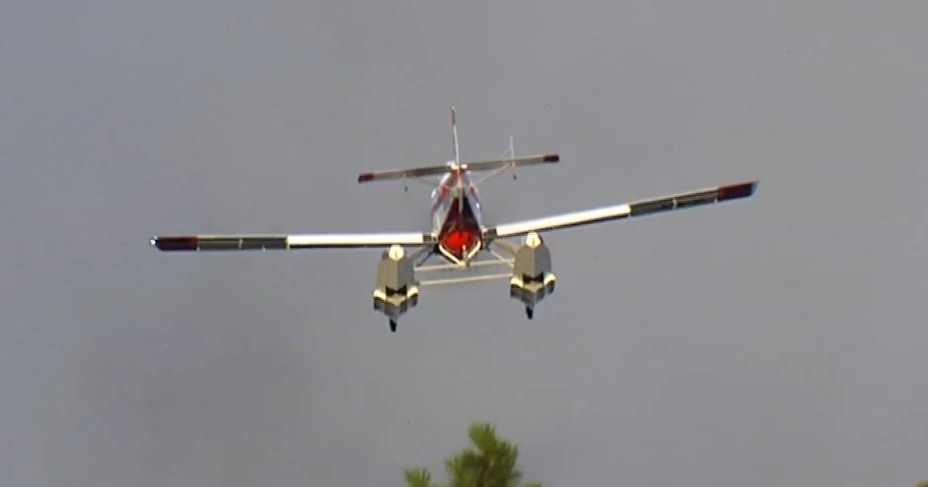 Wildfire air attack crews orchestrated by plane flying high above ...