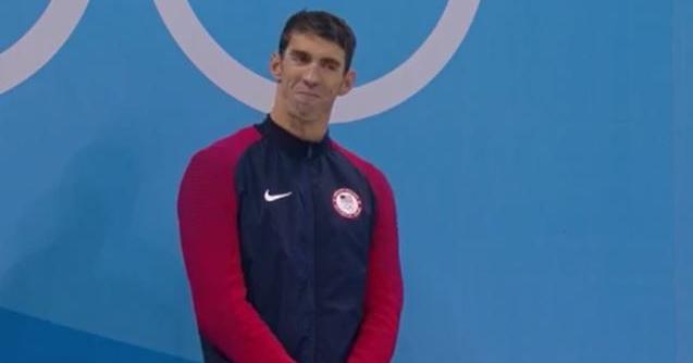 WATCH: Michael Phelps holds back tears on podium | Spokane News | khq.com