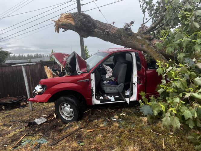 Woman extricated from car, hospitalized after crashing through fence in ...