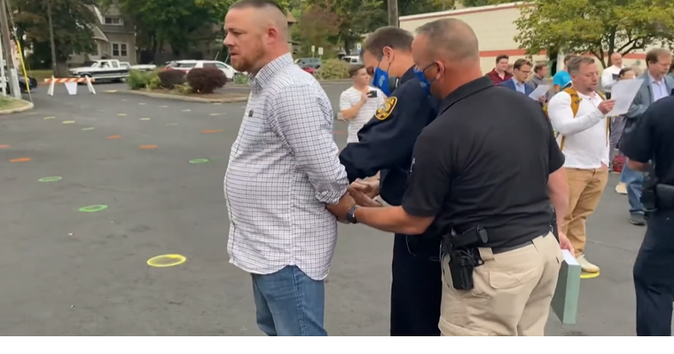 Gabriel Rench being arrested for resisting arrest after being cited for ...