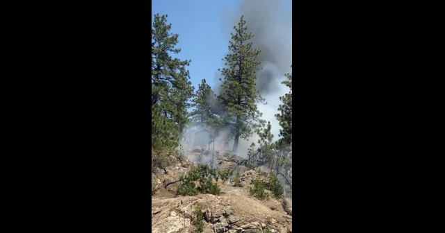 Small brush fire burning near apartment complex in Spokane Valley ...