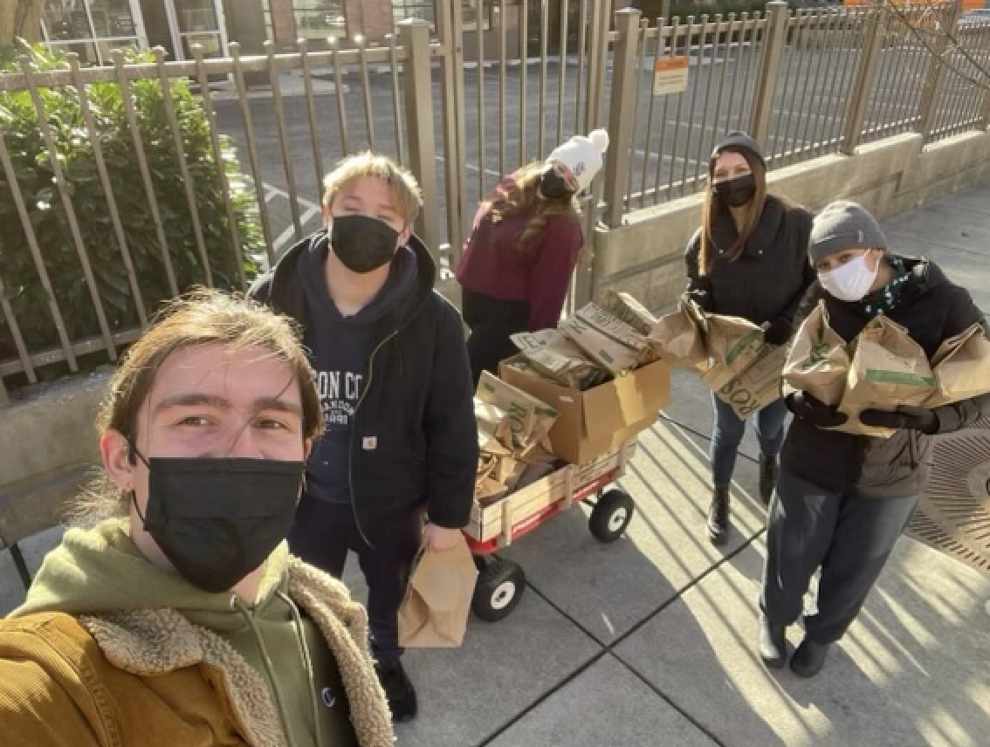Spokane college students hit the streets with wool socks to help people ...