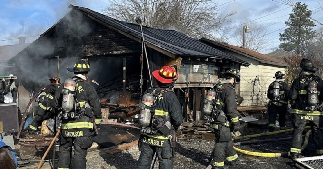 Spokane firefighters stop garage fire from spreading to nearby home ...