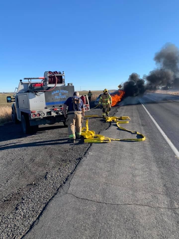 No injuries after car caught fire on Highway 26 | News | khq.com
