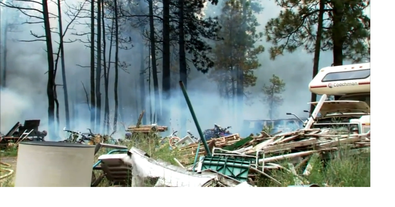 Firefighters on the scene of structure, wildland fire in Cheney ...