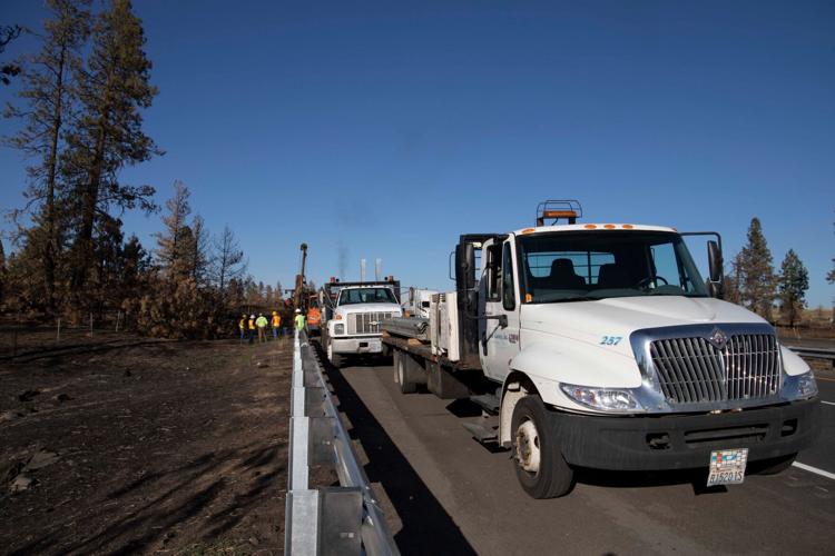 Workers fix guardrail in Medical Lake following Gray fire | | khq.com