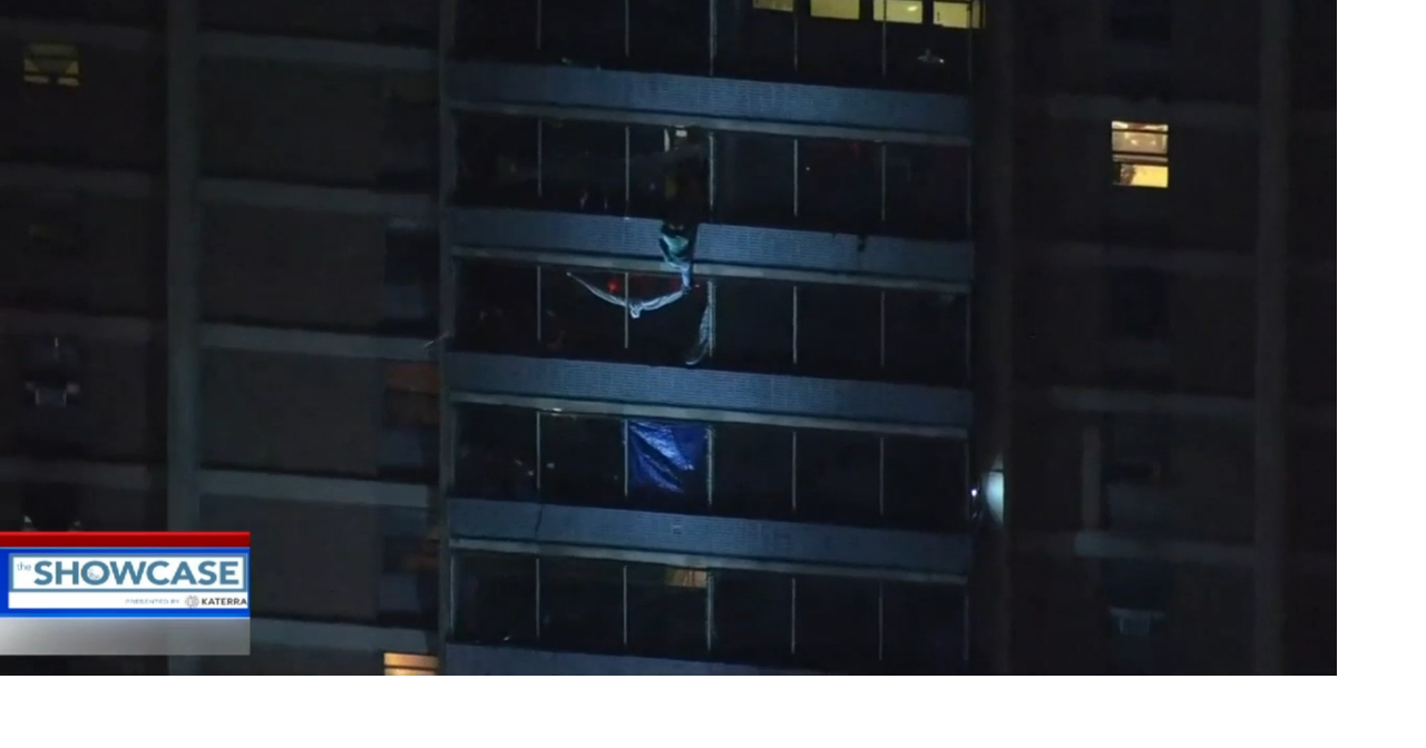 WATCH: Man scales down Philadelphia high-rise to escape fire | Spokane ...