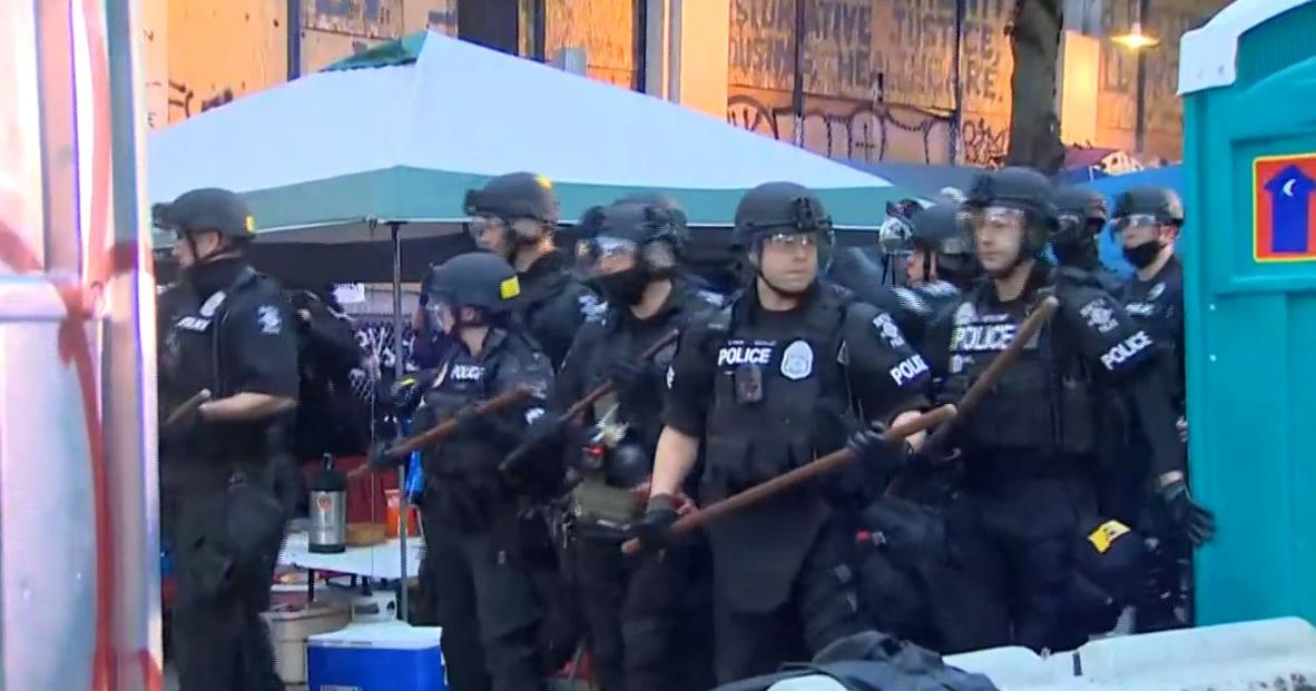 Seattle police clear ‘CHOP’ zone, more than 30 arrested | Spokane News ...