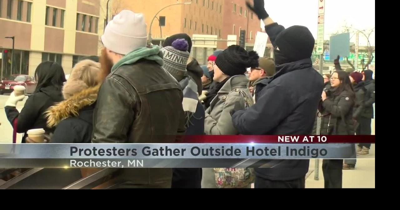 Protesters assemble outside of Hotel Indigo to express concerns about ...