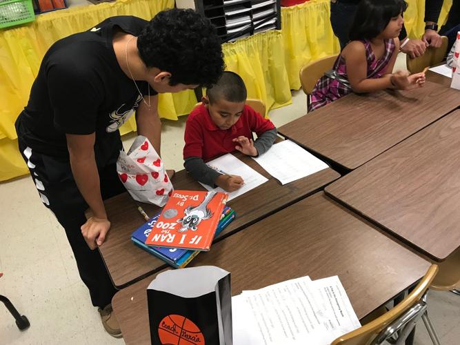 Brahma basketball team visits Harvey, Kleberg elementary schools | News ...