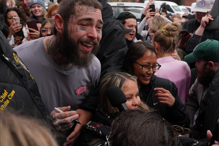 Grammy-nominated artist Post Malone opens custom Raising Cane’s ...