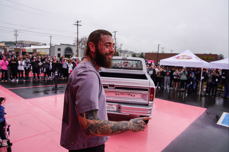 Grammy-nominated artist Post Malone opens custom Raising Cane’s ...