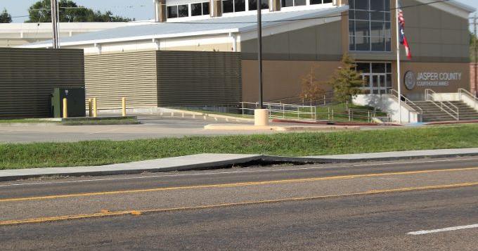 New concrete sidewalk buckles: Who is responsible? | Local News | kjas.com