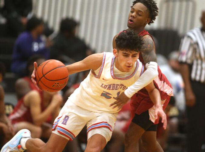 Jasper slips past Lumberton to win Woodville Basketball Tourney ...