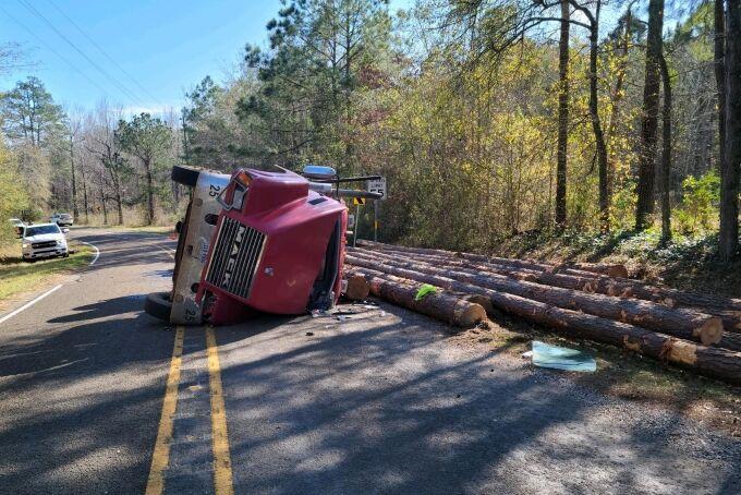 No injuries in a log truck rollover | Local News | kjas.com