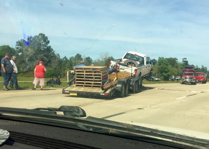 Trucks and trailers stacked like pancakes after crash, fortunately no ...