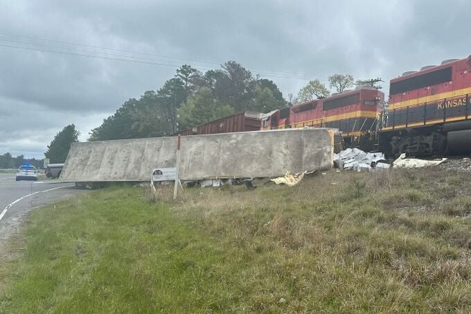 Train hit a big-rig which was stuck on railroad tracks south of ...