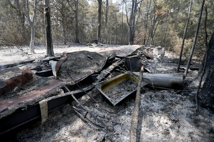 Fire scene photos capture the terrible aftermath of the blaze and the ...