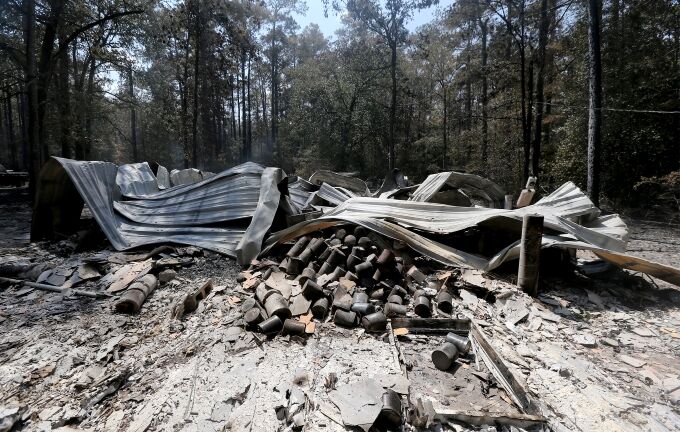 Fire scene photos capture the terrible aftermath of the blaze and the ...