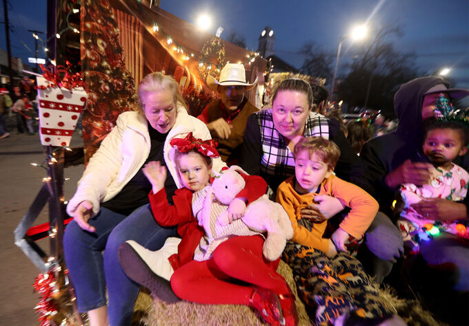Santa Claus comes to town on top of a fire truck | Local News | kjas.com