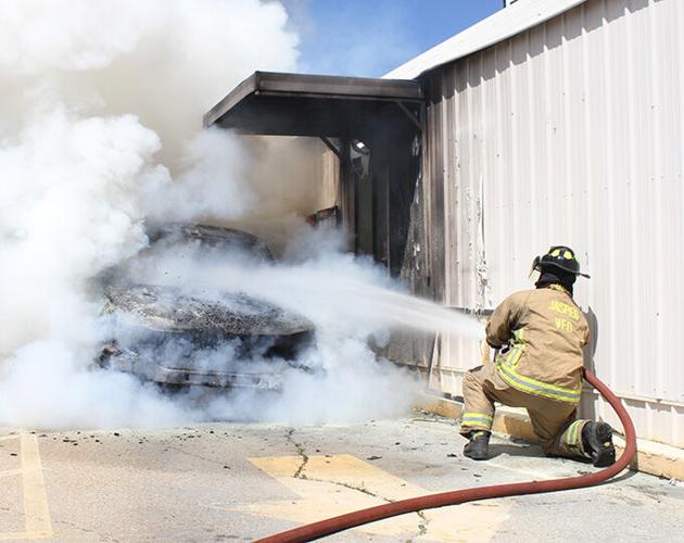 Truck catches on fire at the window of Brookshire Brothers Tobacco Barn ...