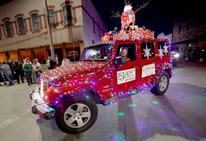 Santa Claus comes to town on top of a fire truck | Local News | kjas.com