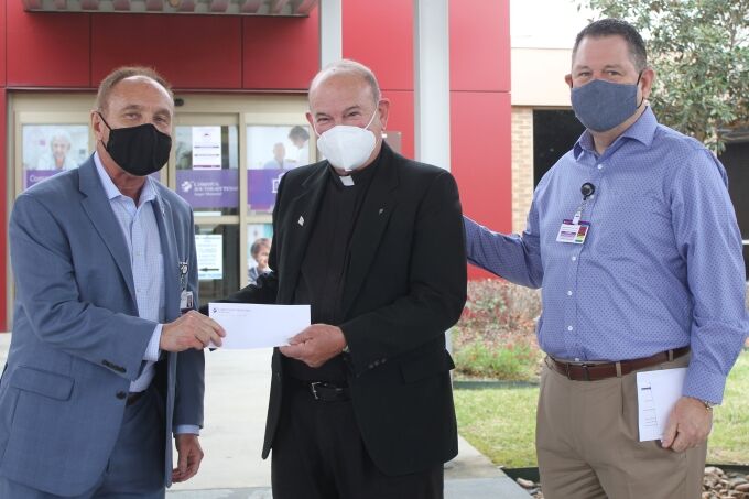 Father Ron honored for receiving the prestigious Lumen Christi Award ...