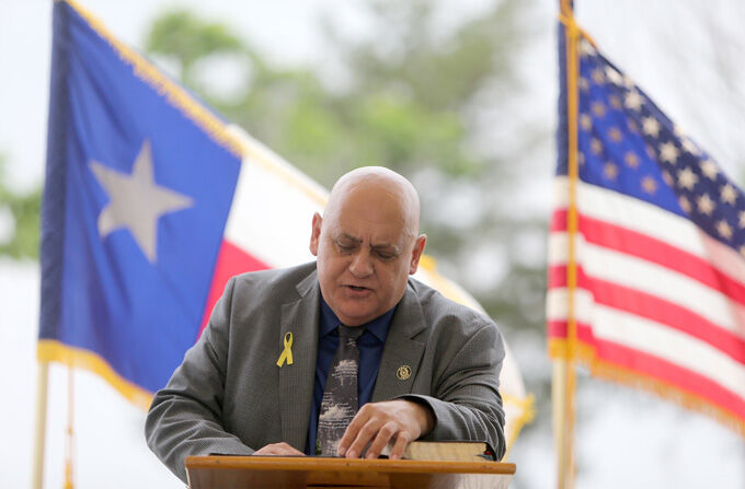 Local corrections officers observe those that have died in their ranks ...