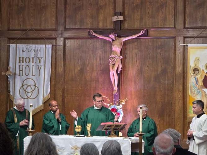 Father Regimon George officially installed as new priest at St. Michael ...