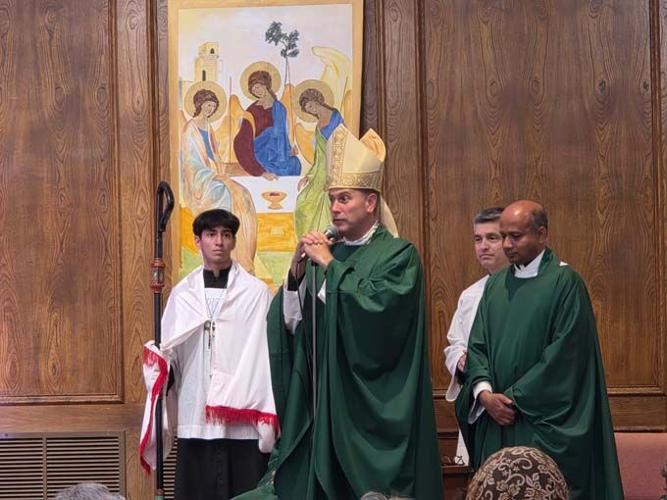 Father Regimon George officially installed as new priest at St. Michael ...