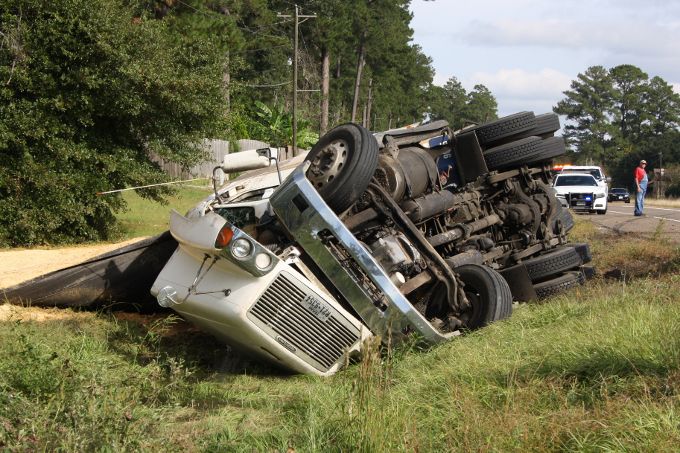 Trucker uninjured after loaded big-rig rolled over | Local News | kjas.com