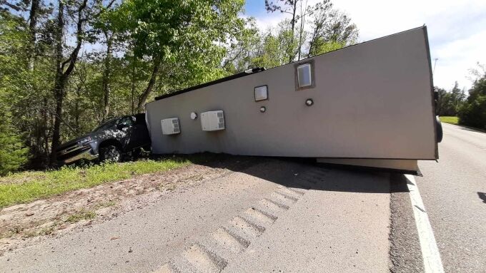 No injuries after driver rolled and jack-knifed a travel trailer ...