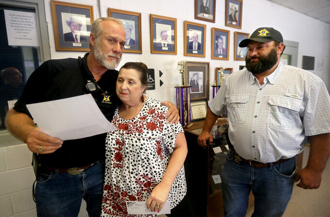 Law enforcement organization gives money local officer who recently ...