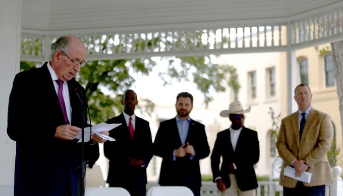 Local and state officials gather with Provalus for ceremonial ...