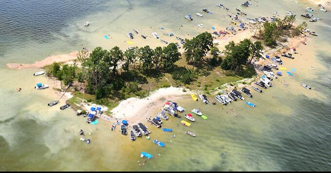 People enjoy the cool water of Lake Sam Rayburn on a hot day | Local ...