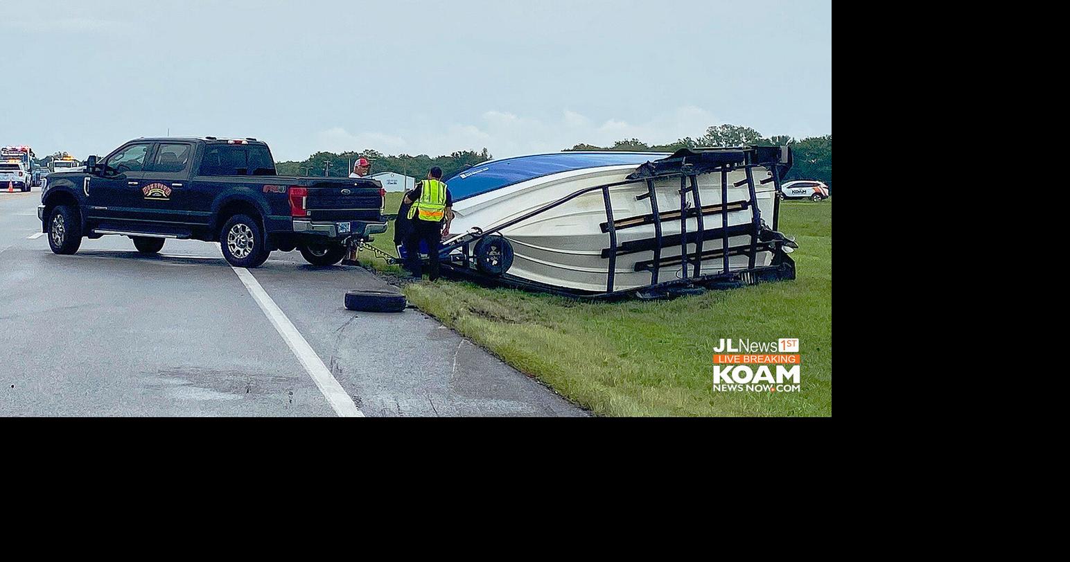 SUV swerving in traffic, t-bones a boat, which flips in Joplin | Joplin ...