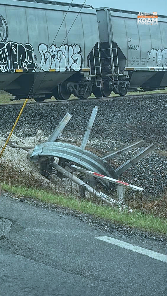 Train collides with high-centered oversized load at Carl Junction ...