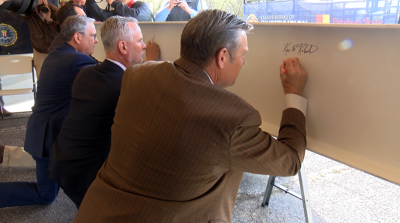 KBI celebrates construction milestone with beam signing ceremony in ...