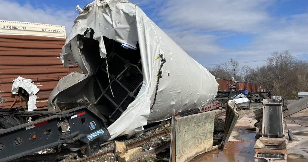 Train crashes with tractor trailer hauling 196 ft. silo tank, NTSB ...