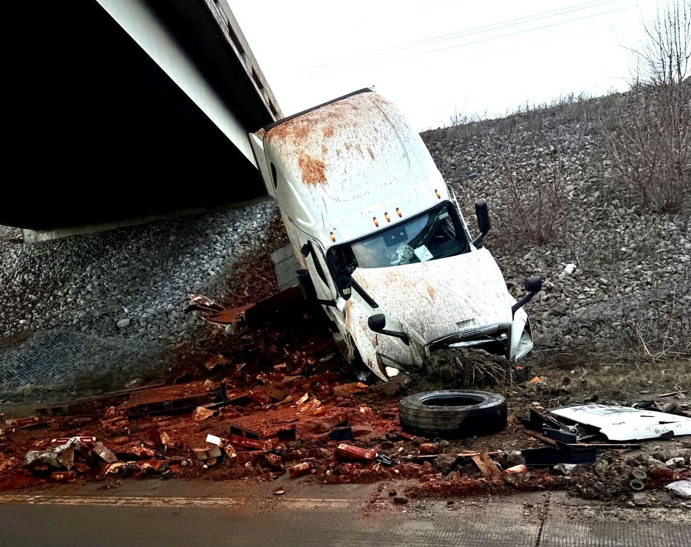 Two tractor trailers collide - pasta sauce and meat scatter, closing ...