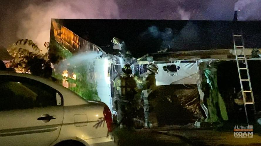 House fire leaves family displaced, major damage to rear of residence ...